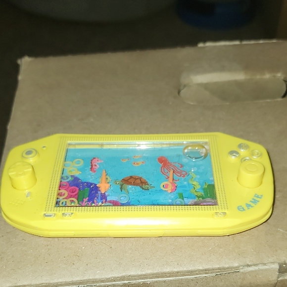 Toys | Yellow Handheld Water Game Console | Poshmark